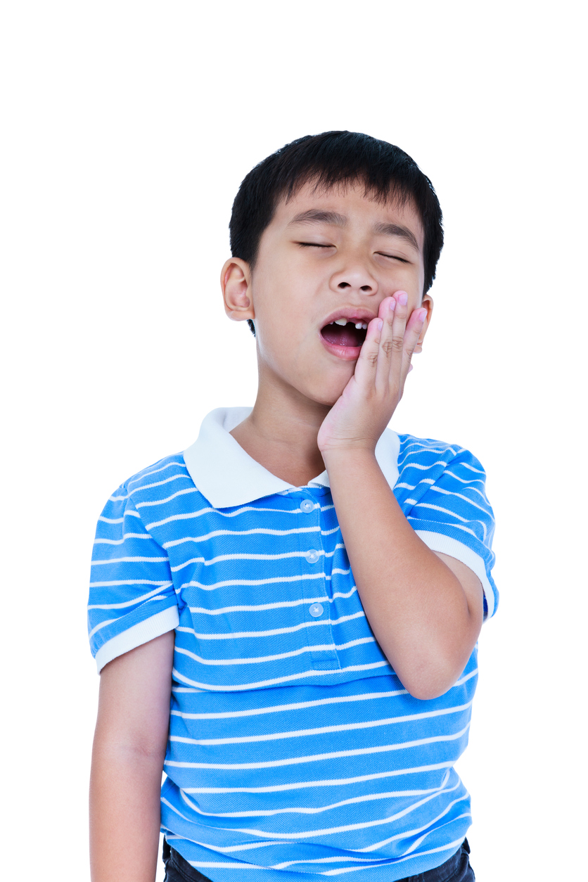 Asian child suffering from toothache. Isolated on white background ...